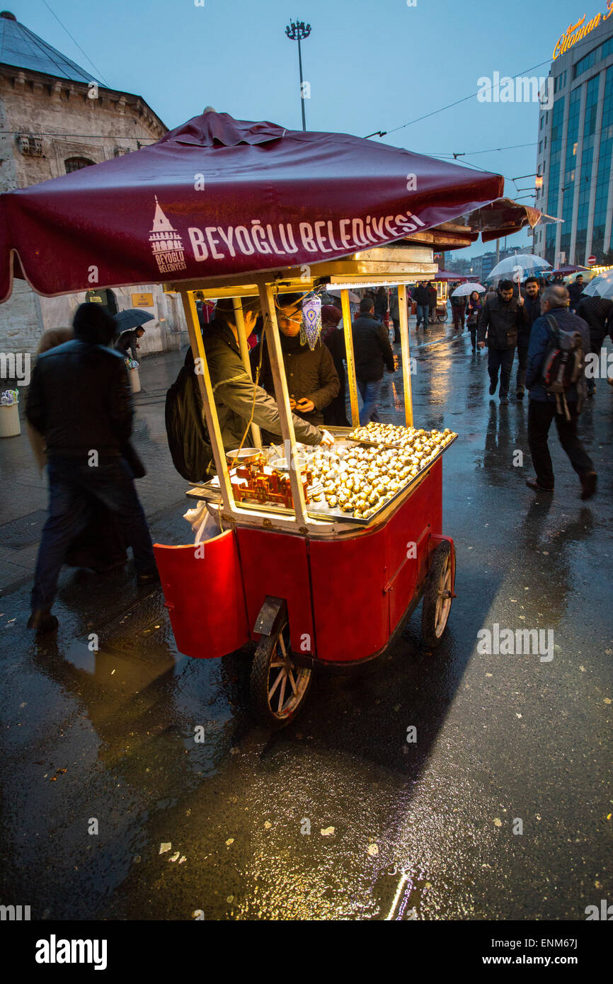 A Street vendor serves snacks at Sunset Stock Photo - Alamy