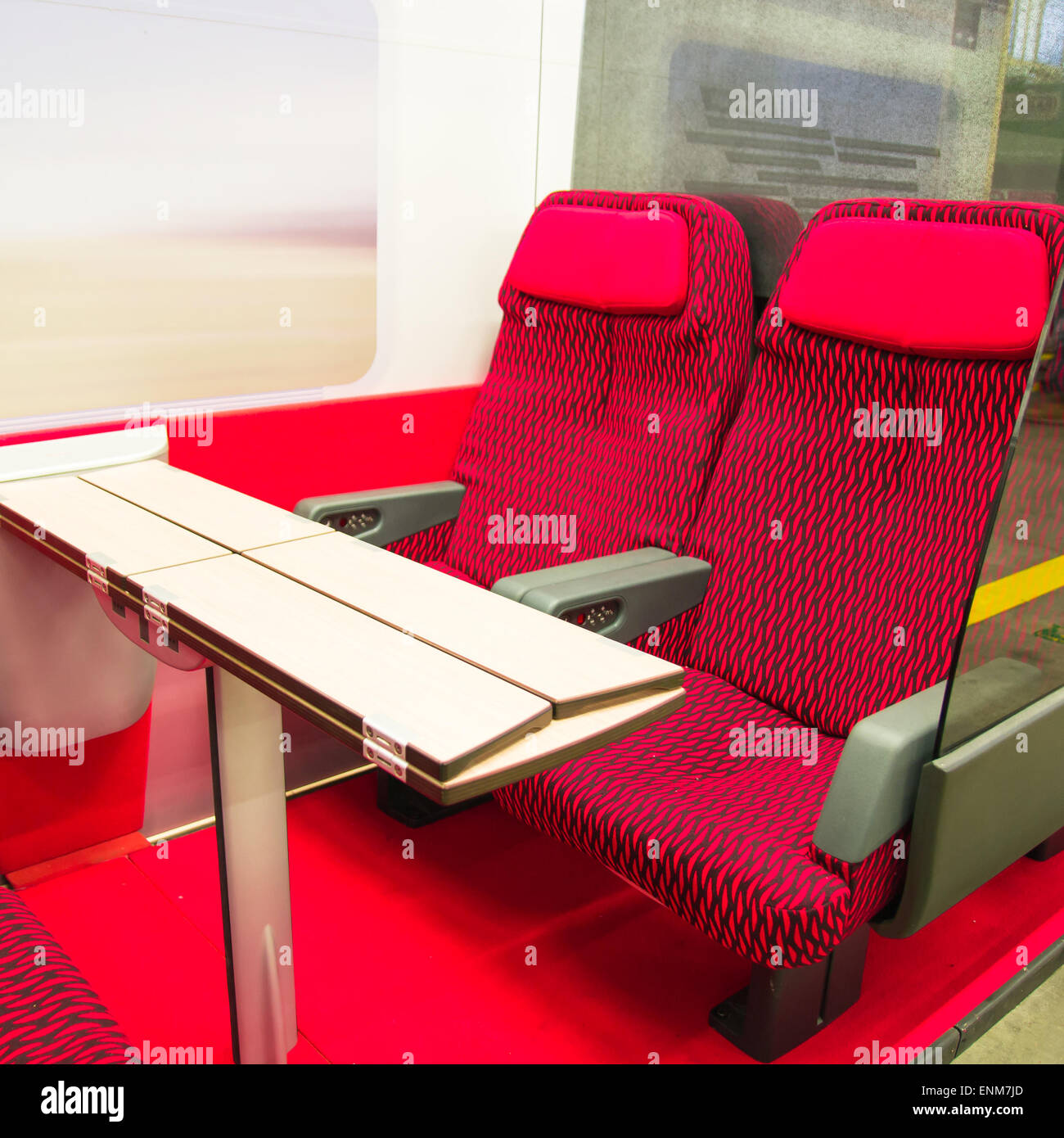 red modern seats of a railroad car Stock Photo - Alamy
