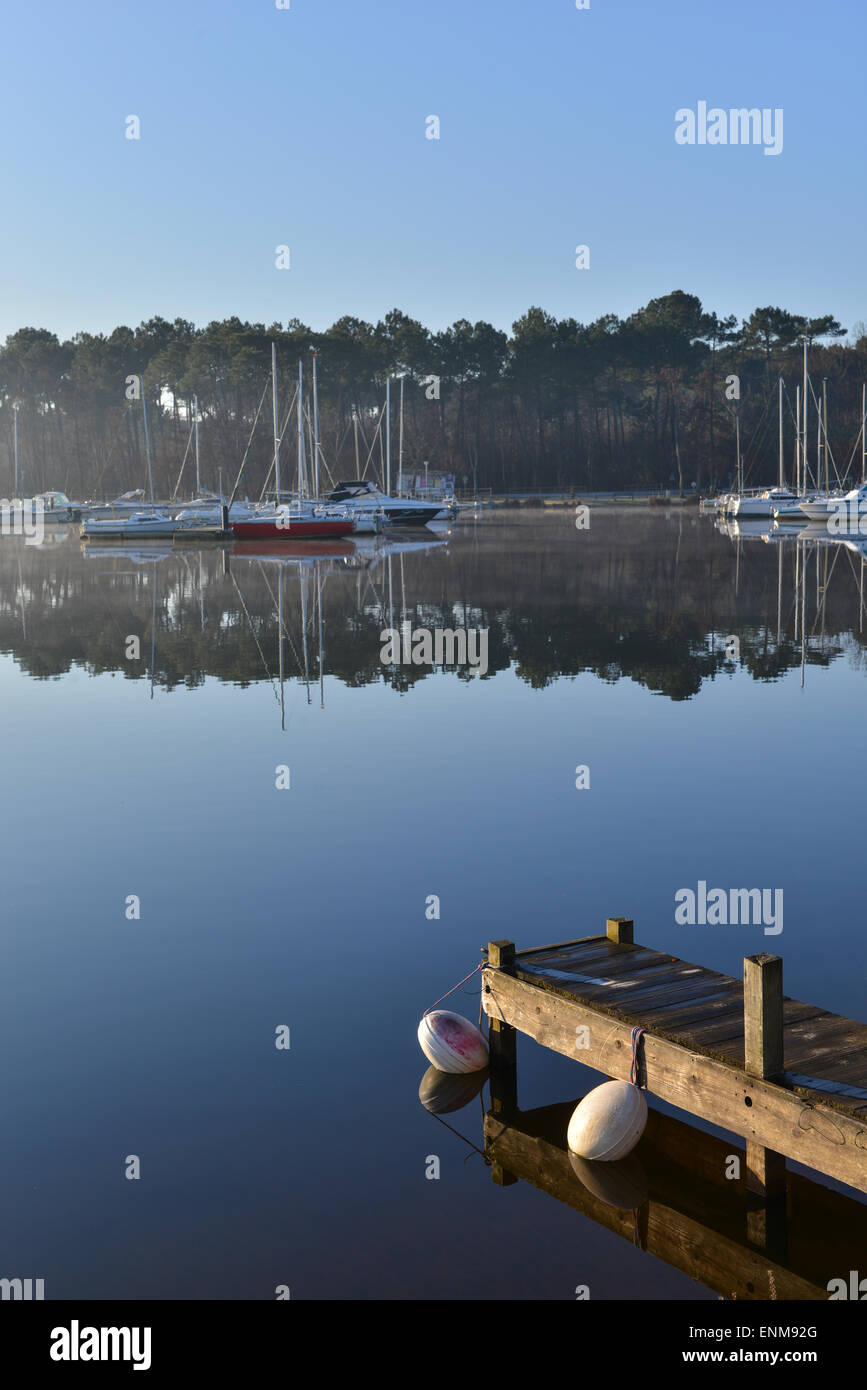 Landscape with jetty on lake Stock Photo - Alamy
