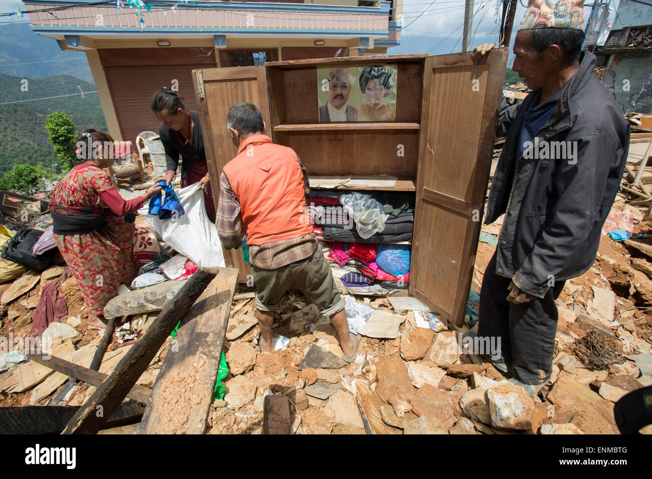 Residents of Chautara town dig through the rubble of their homes in ...