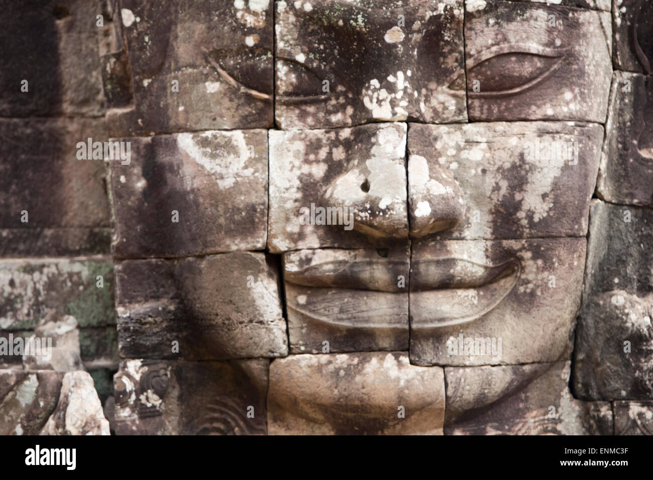 Giant stone face at the Bayon temple at Angkor Wat in Siem Reap ...