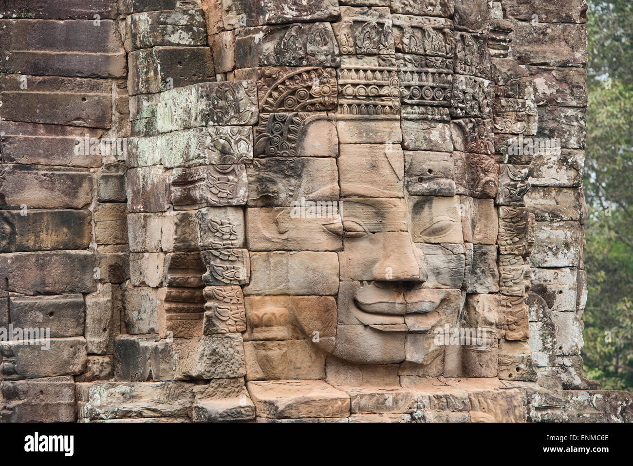 Giant stone face at the Bayon temple at Angkor Wat in Siem Reap ...