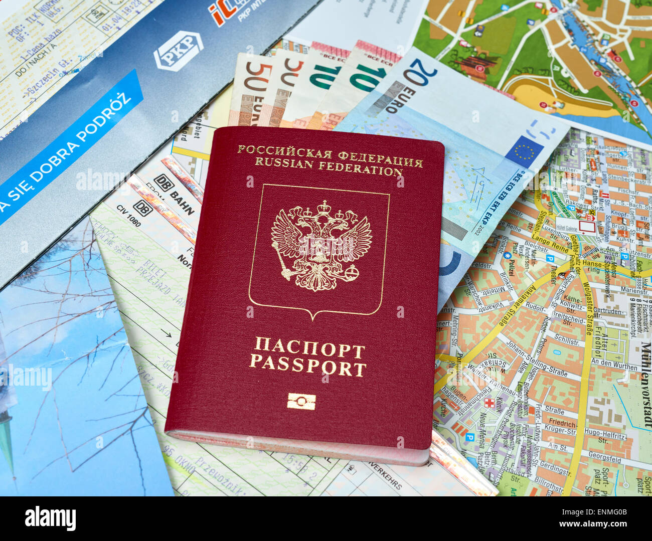 Russian passport and Euro banknotes on the map background Stock Photo ...