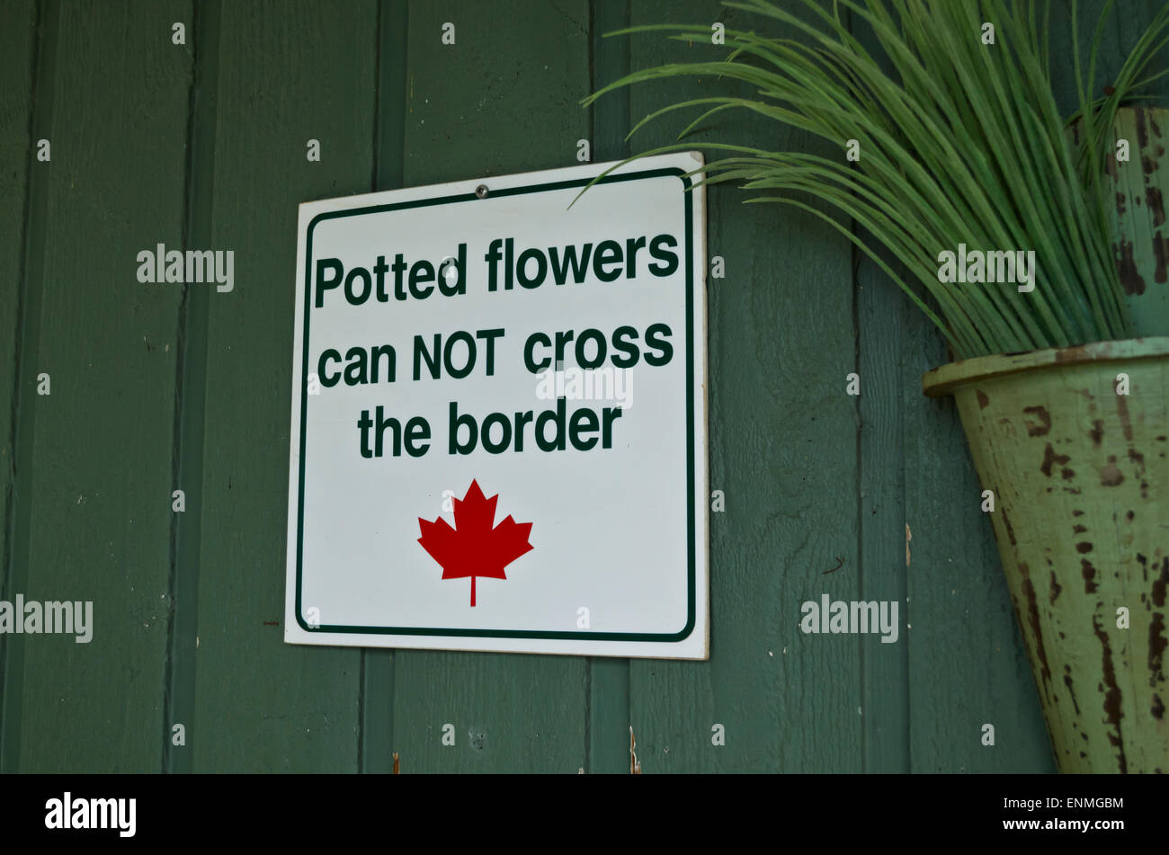 Sign indicating cross-border restrictions forbidding bringing potted ...