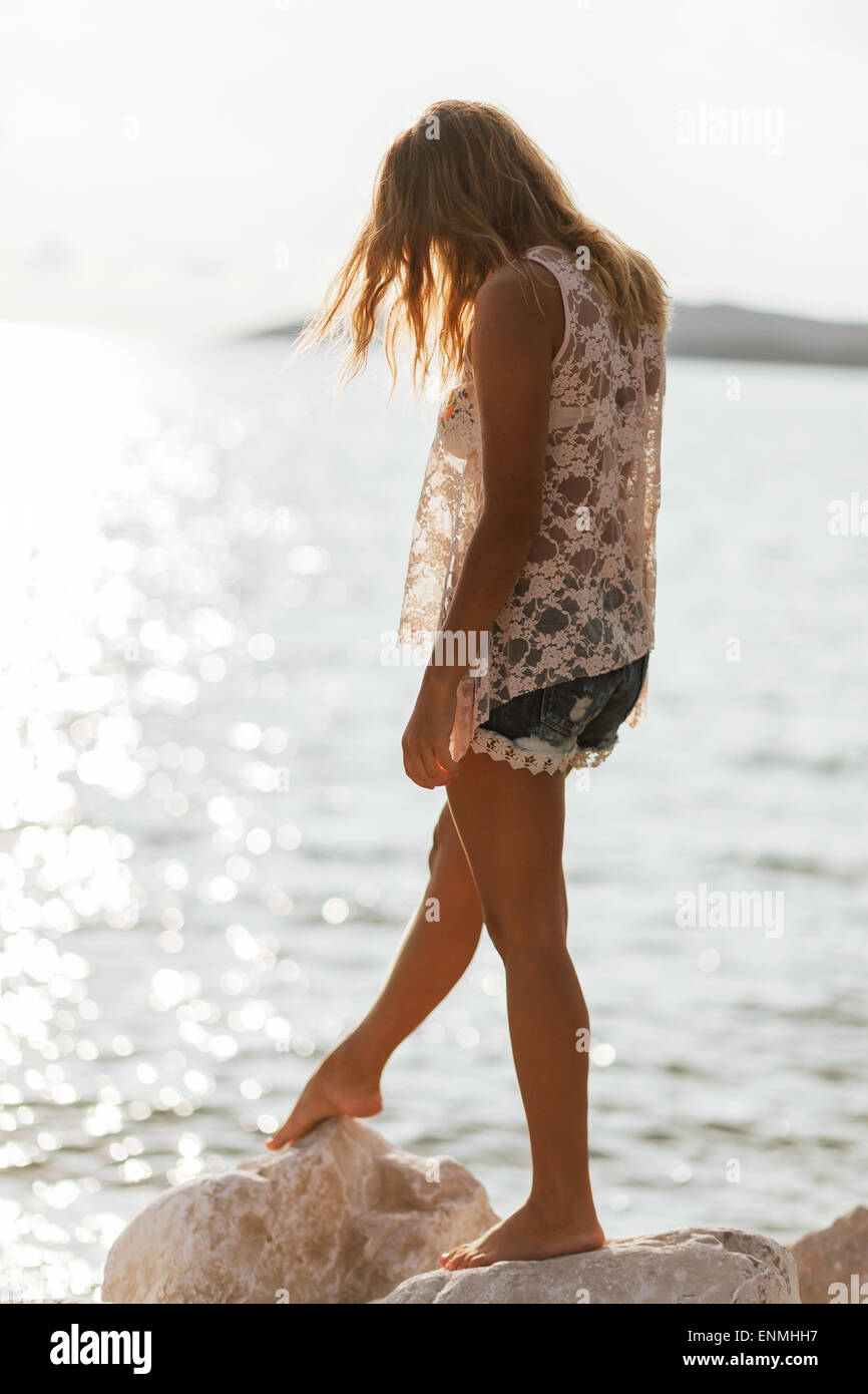 Back view beach sea hi-res stock photography and images - Alamy