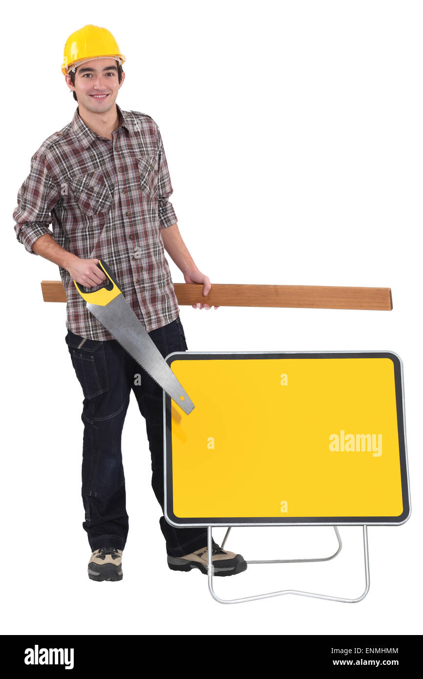 Workman with equipment Stock Photo - Alamy