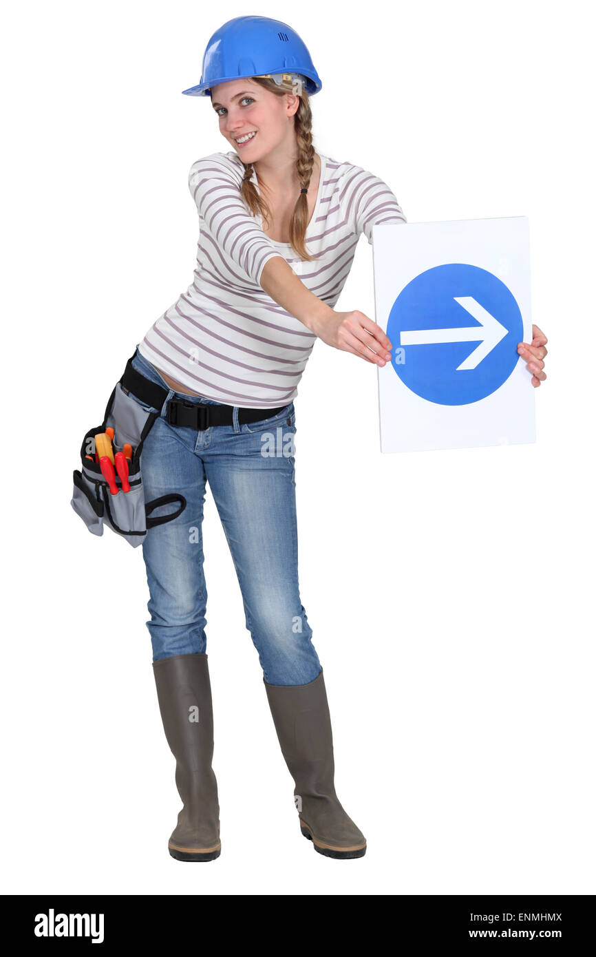 Woman with arrow sign Stock Photo - Alamy