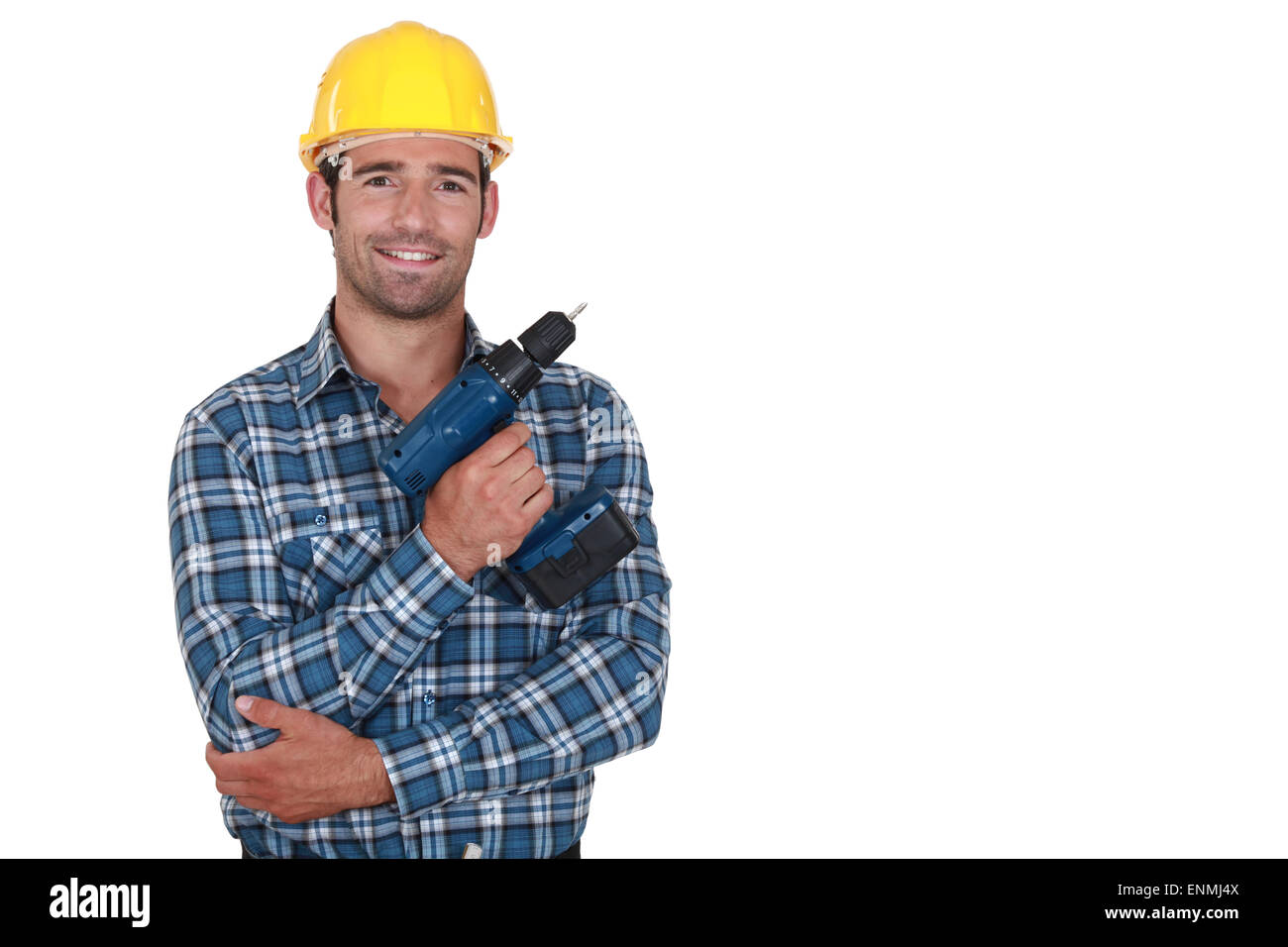 Worker holding cordless drill Stock Photo - Alamy