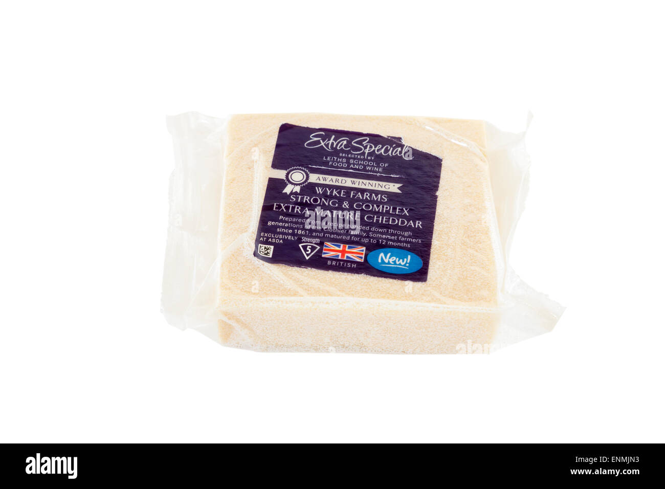 A block of Wyke Farms strong and complex extra mature cheddar cheese ...