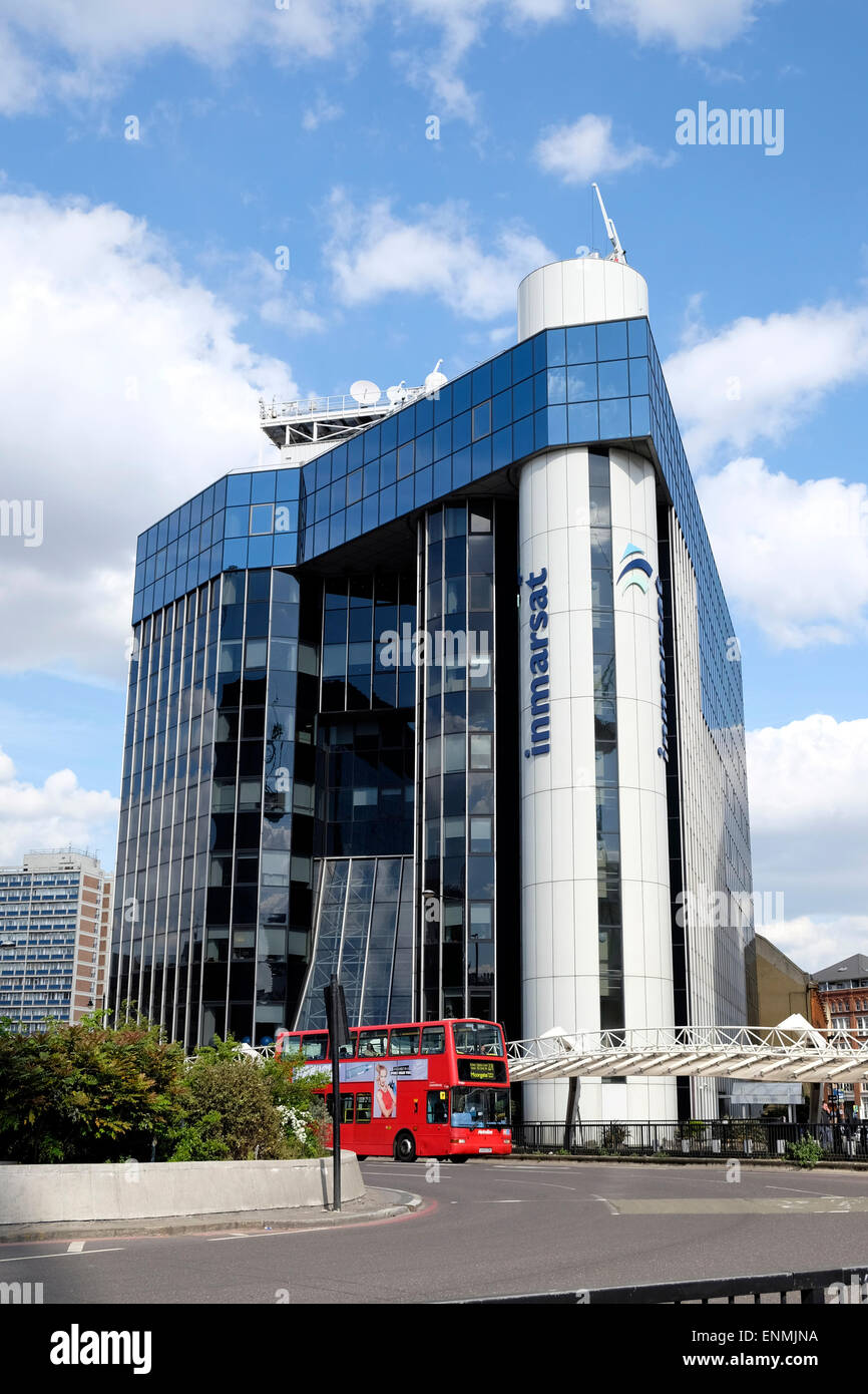 Red double-decker London bus passing the Inmarsat building on Old ...