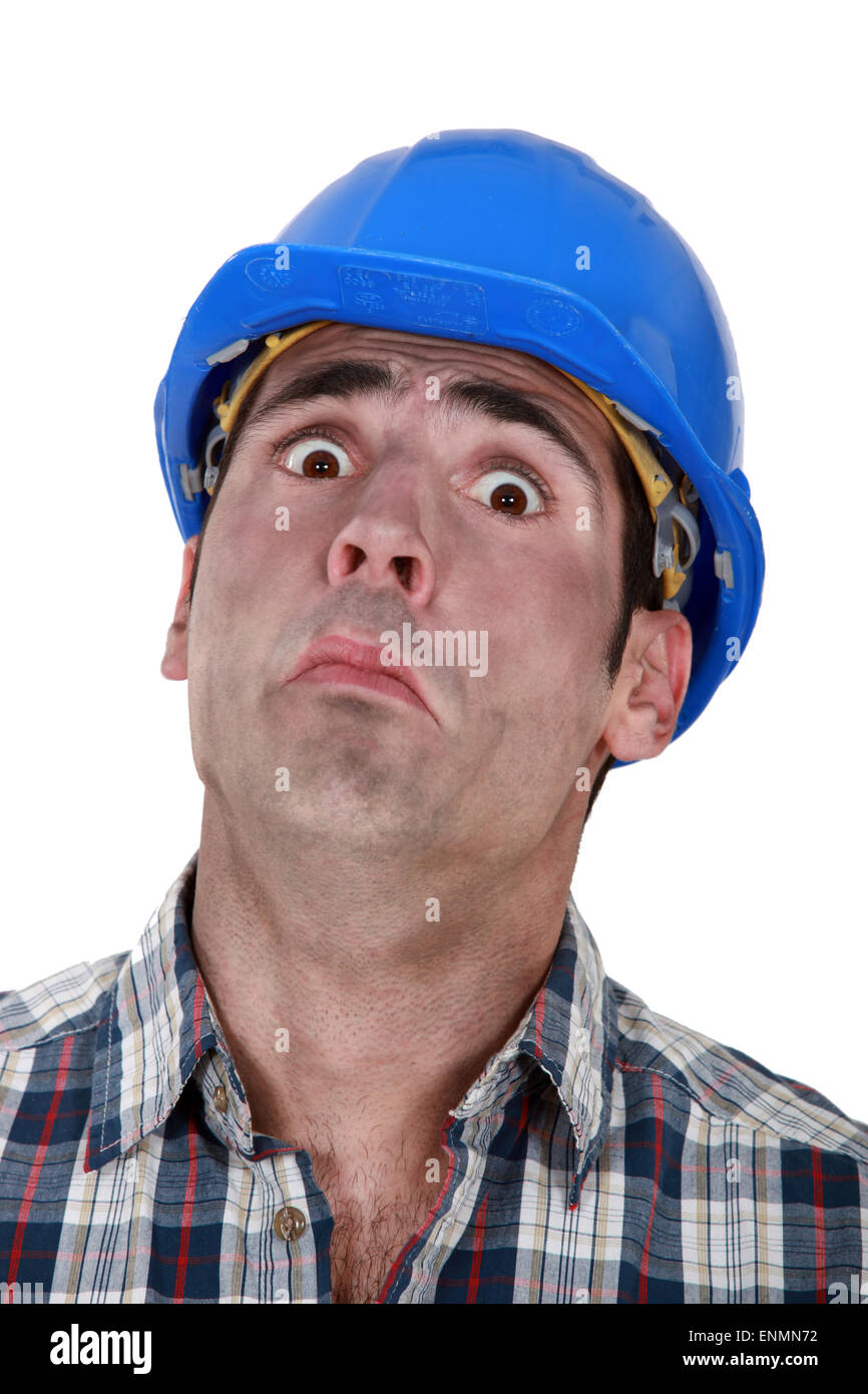 A fearful construction worker Stock Photo - Alamy