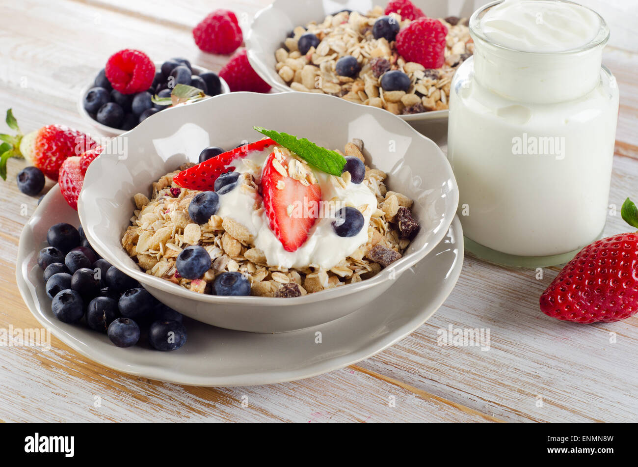 Breakfast with ripe berries, yogurt and muesli. Selective focus Stock ...