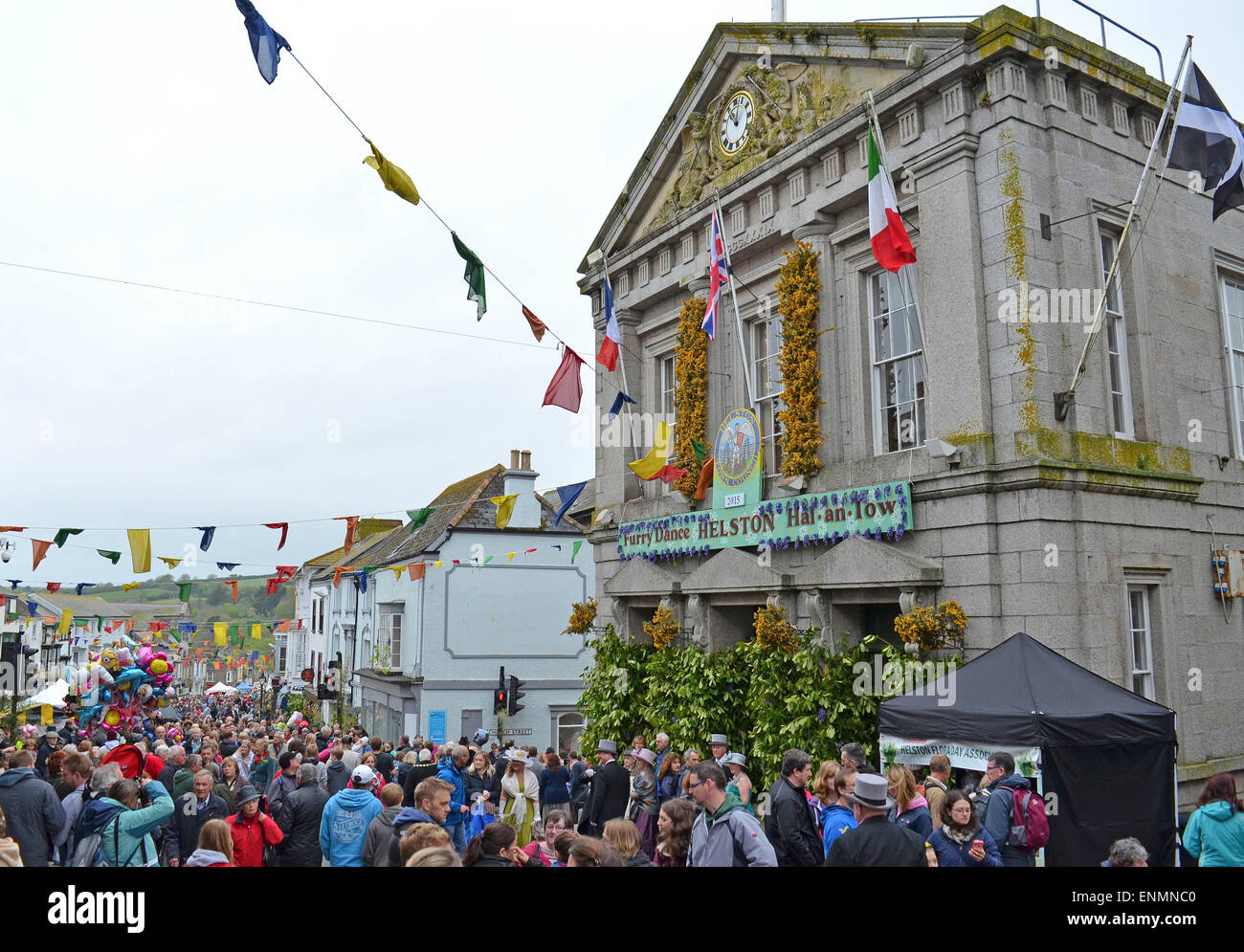The streets of Helston in Cornwall, UK are packed with people during ...
