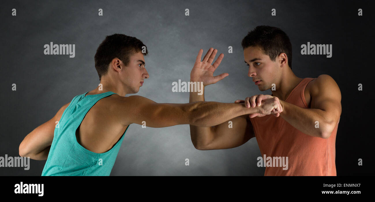 young men wrestling Stock Photo - Alamy