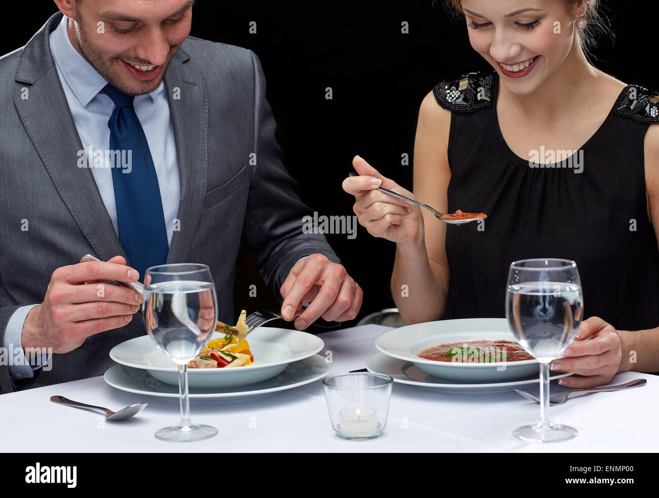 Couple eating at restaurant hi-res stock photography and images - Alamy