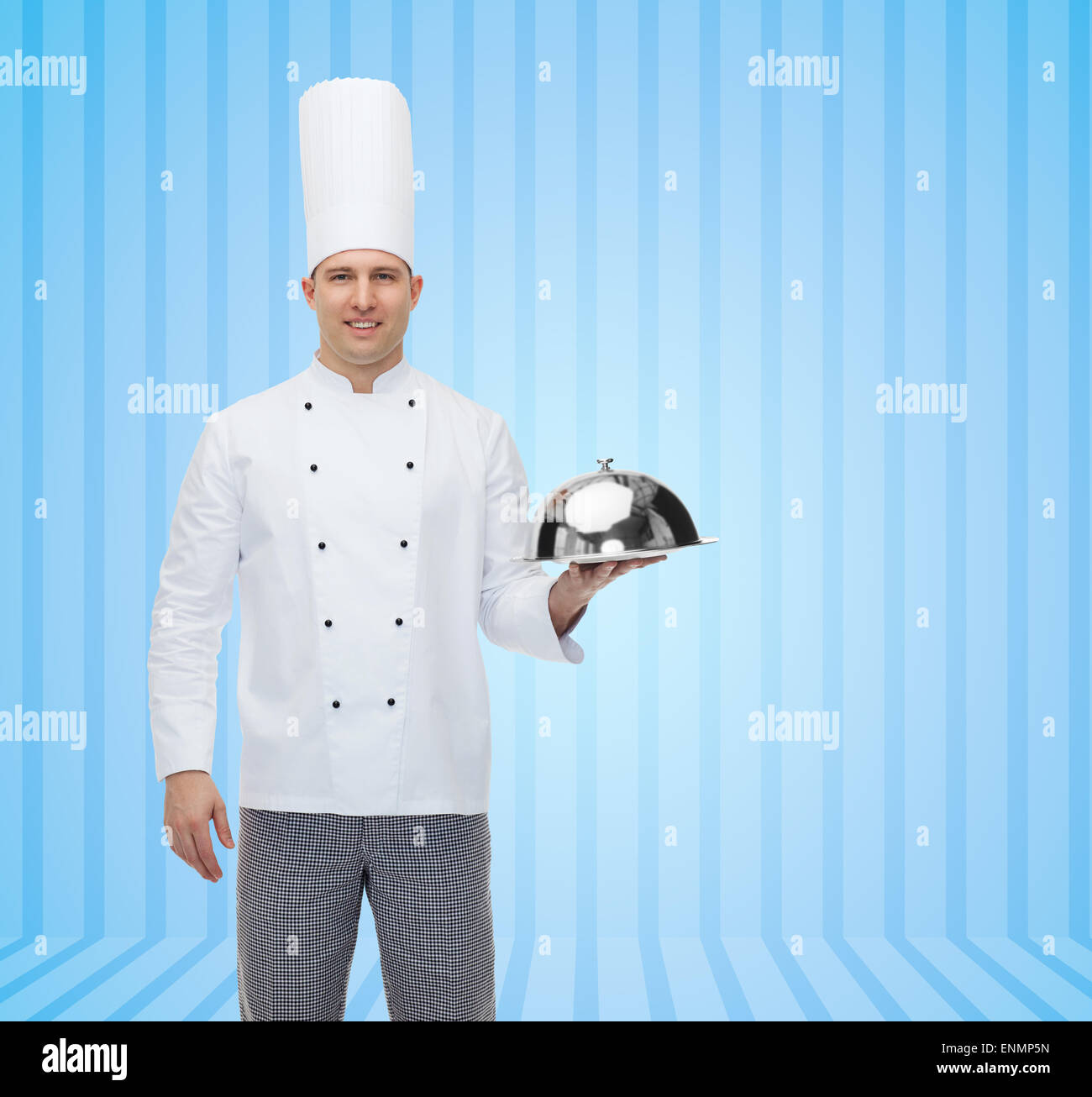happy male chef cook holding cloche Stock Photo - Alamy