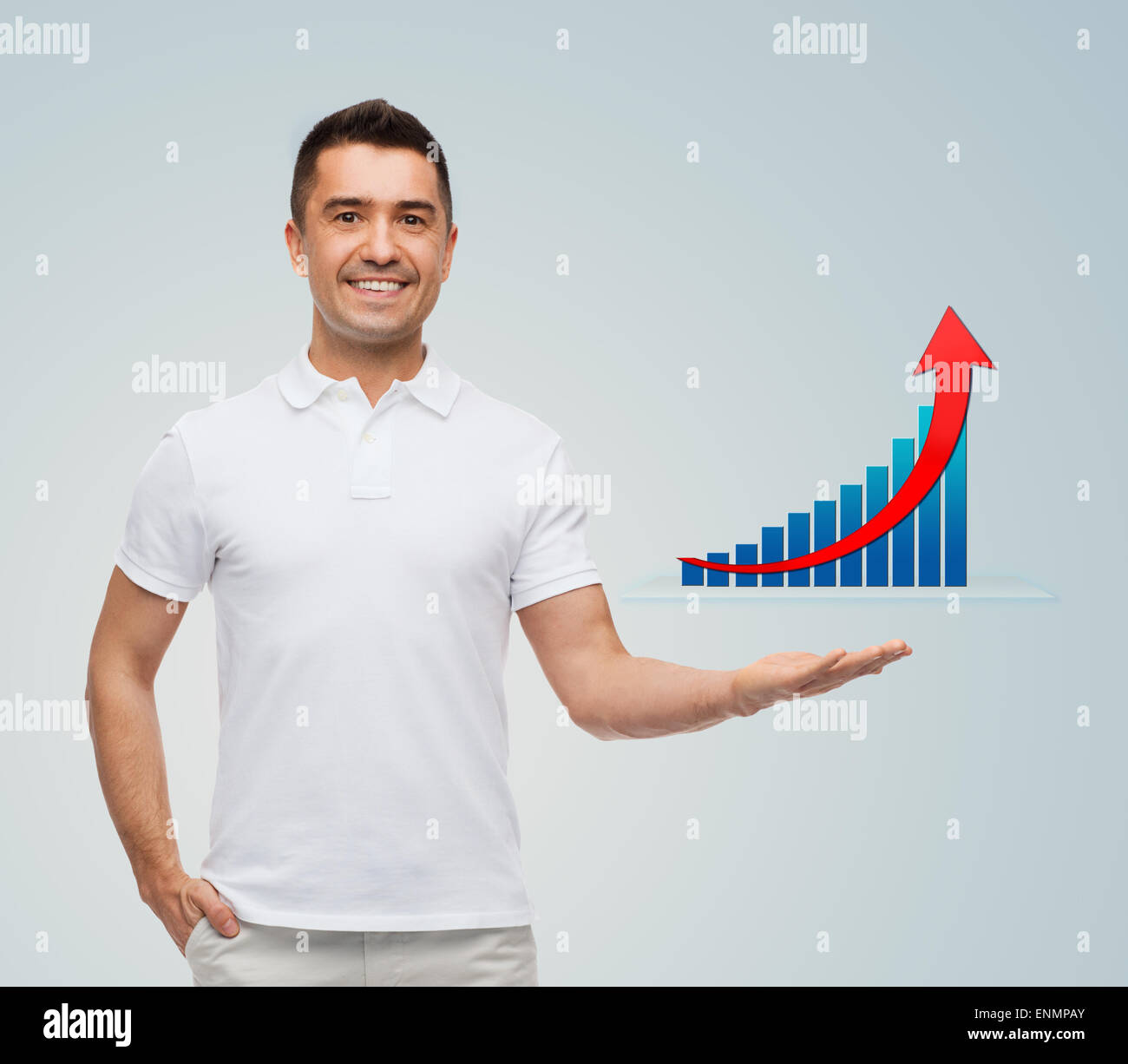 smiling man showing something on empty palm Stock Photo - Alamy
