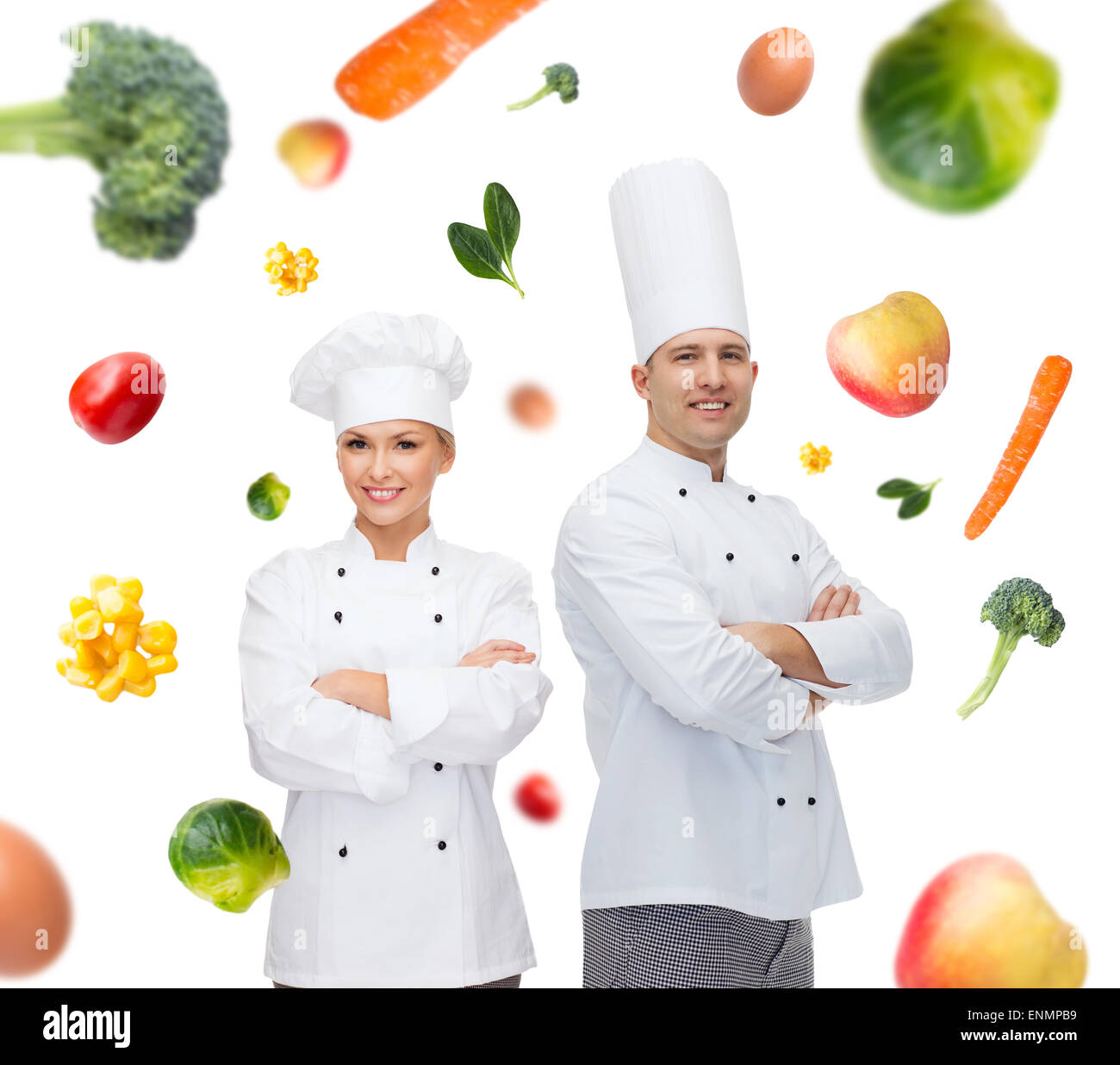 happy chef couple or cooks over food background Stock Photo - Alamy