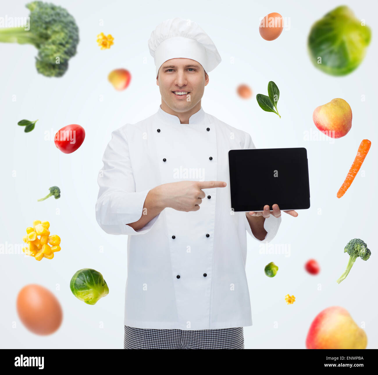 happy male chef cook showing with tablet pc Stock Photo - Alamy
