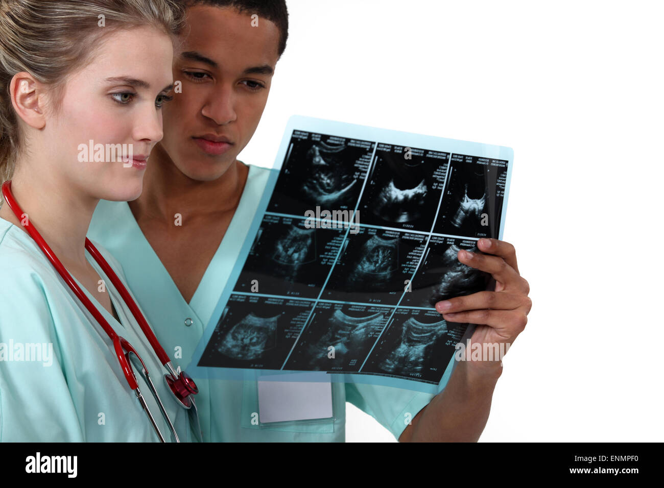 Medical workers looking at scans Stock Photo - Alamy