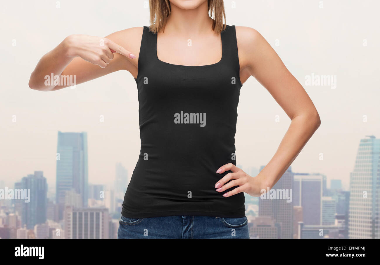 close up of woman in blank black tank top Stock Photo - Alamy