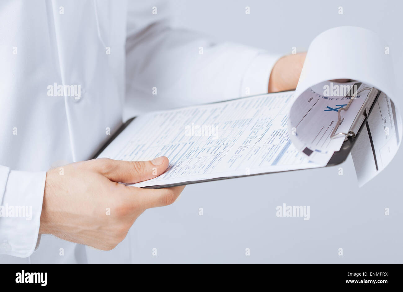 male doctor holding prescription paper in hand Stock Photo - Alamy