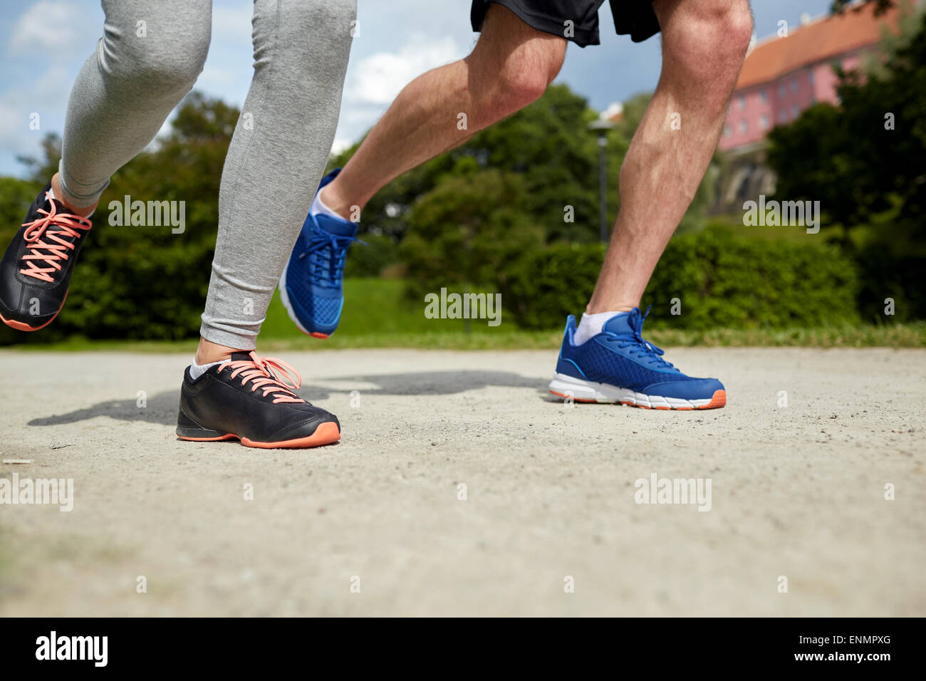 close up of couple running outdoors Stock Photo - Alamy