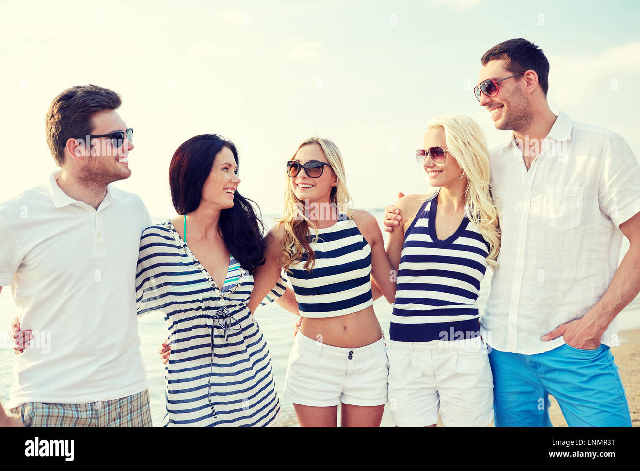 Talking at beach hi-res stock photography and images - Alamy