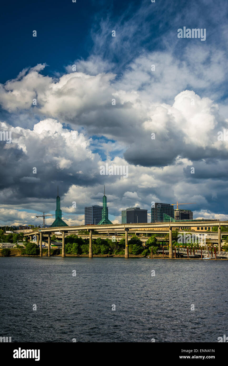 View of dramatic clouds over the Williamette River, in Portland, Oregon ...
