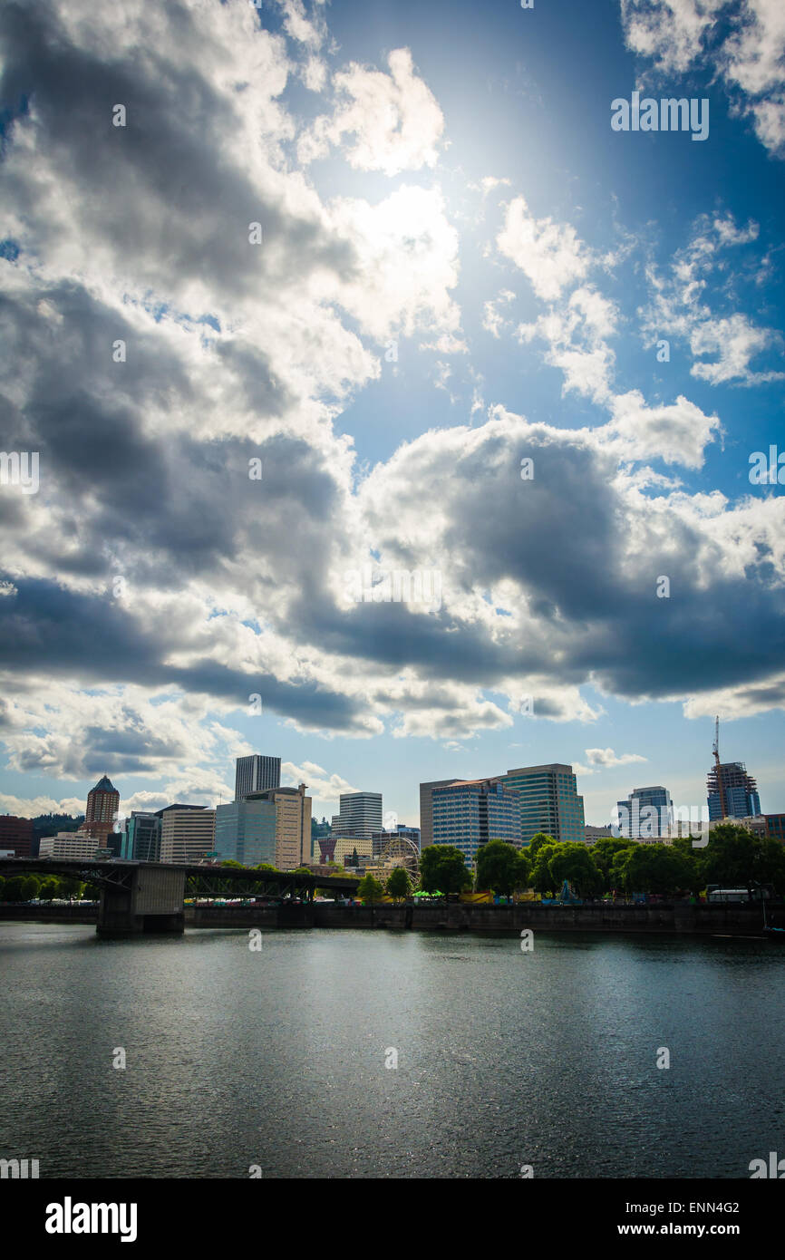 Dramatic sky over the Portland skyline and Williamette River, in ...