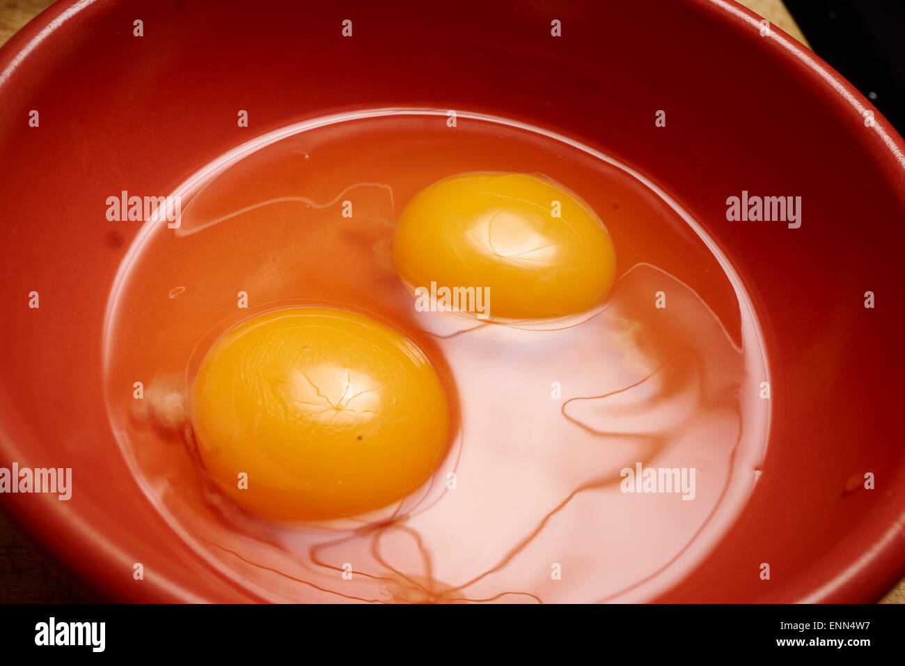 bowl with raw egg Stock Photo - Alamy