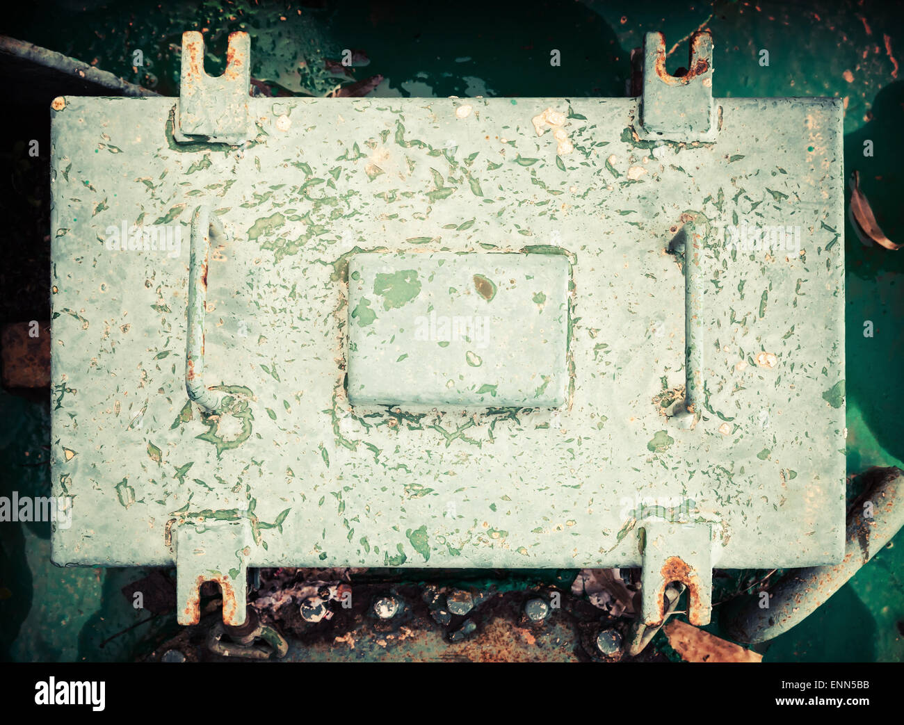 Old industrial box cover with handles, vintage toned photo with old ...
