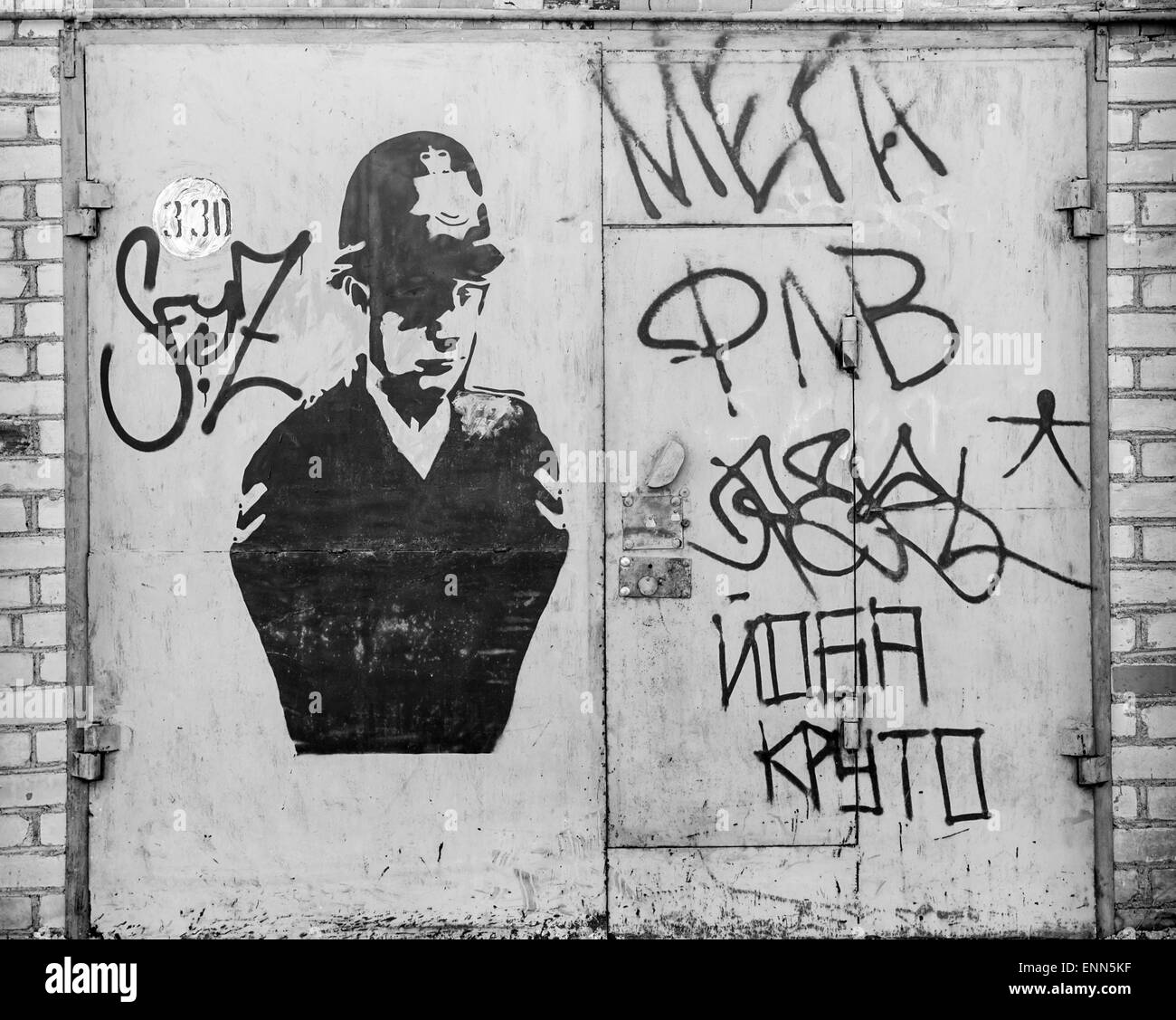 Urban vandal spray art on in black and white including a painted ...