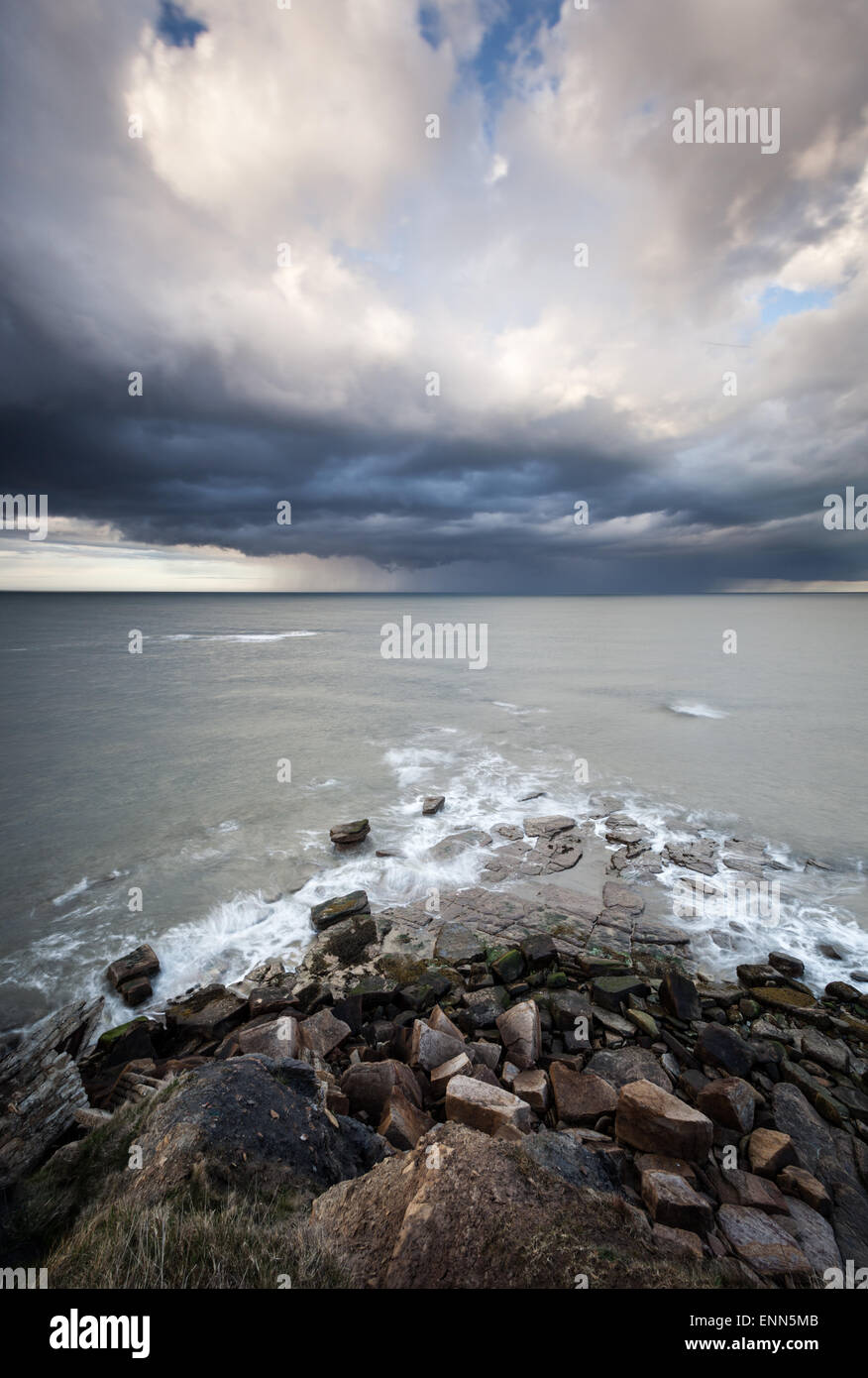 Intense rain storm out over the North Sea and with rocks and crashing ... Intense rain storm out over the North Sea and with rocks and crashing ...