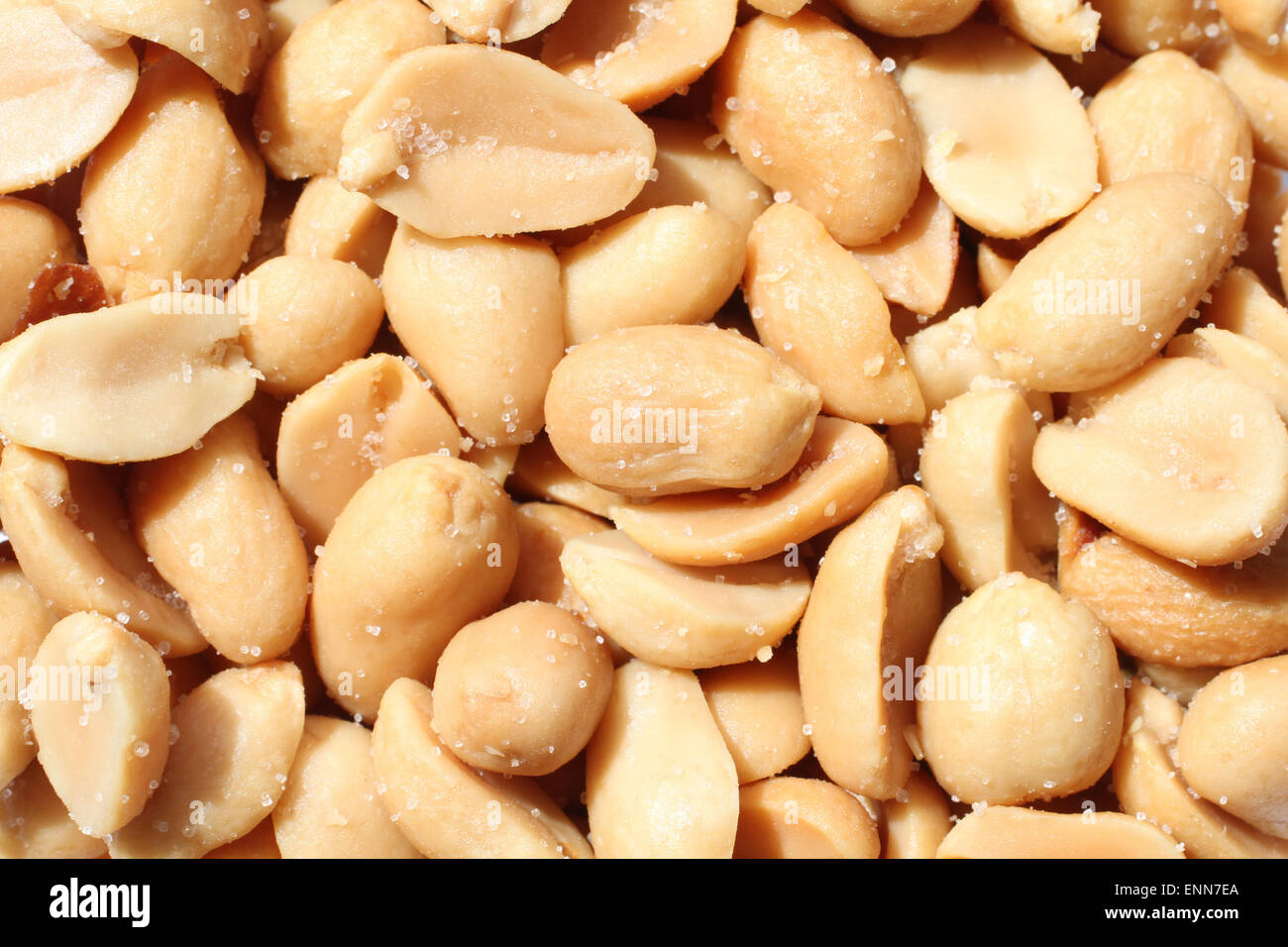 Salted peanuts background Stock Photo - Alamy