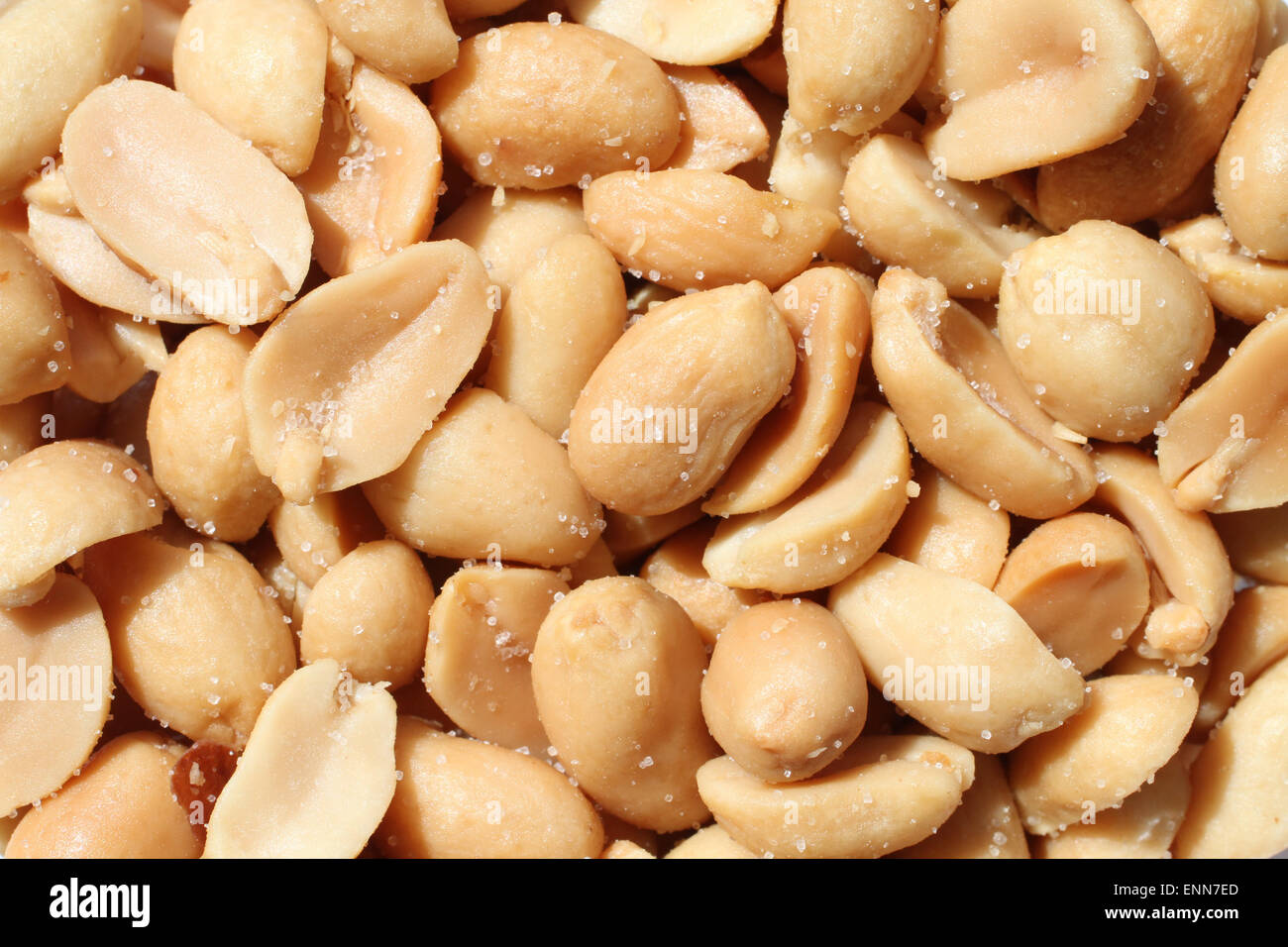 Salted peanuts background Stock Photo - Alamy