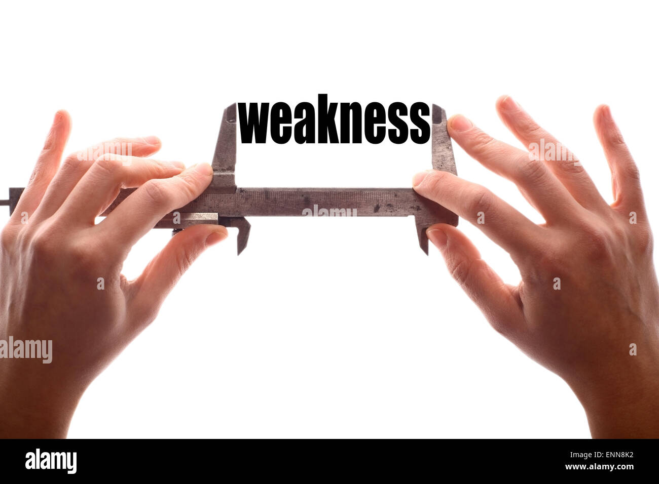 Color horizontal shot of two hands holding a caliper and measuring the ...