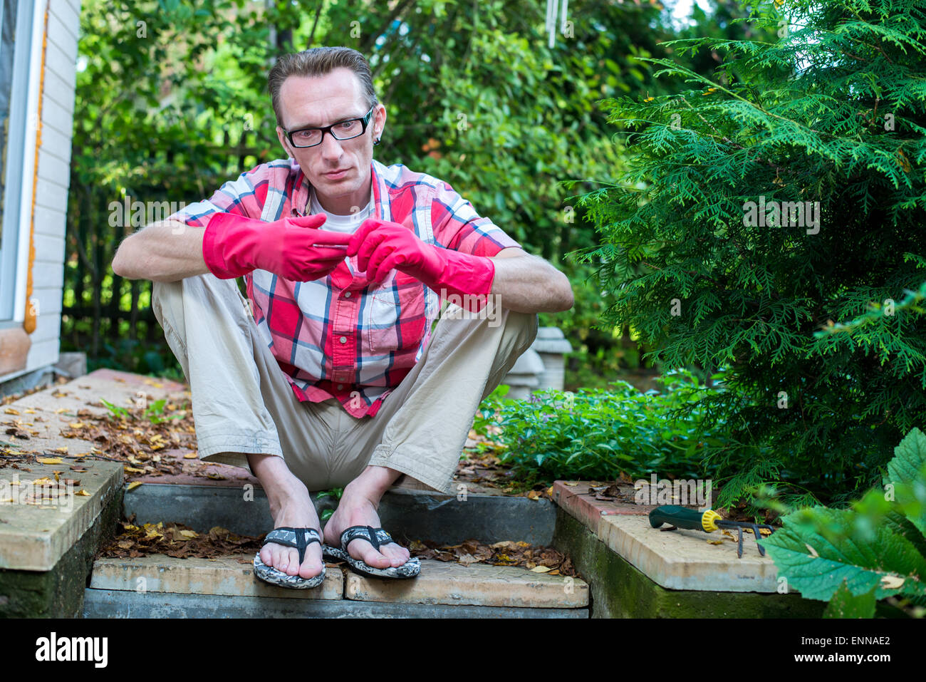 Exhausted gardener hi-res stock photography and images - Alamy