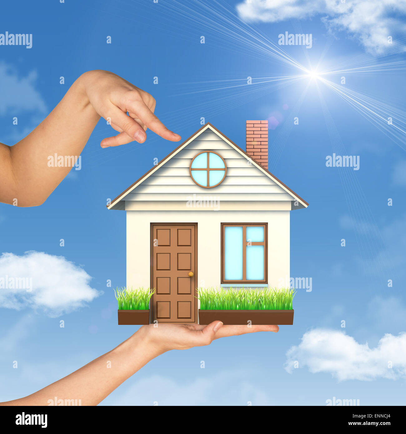 Womans hand fingering at house on palm Stock Photo - Alamy