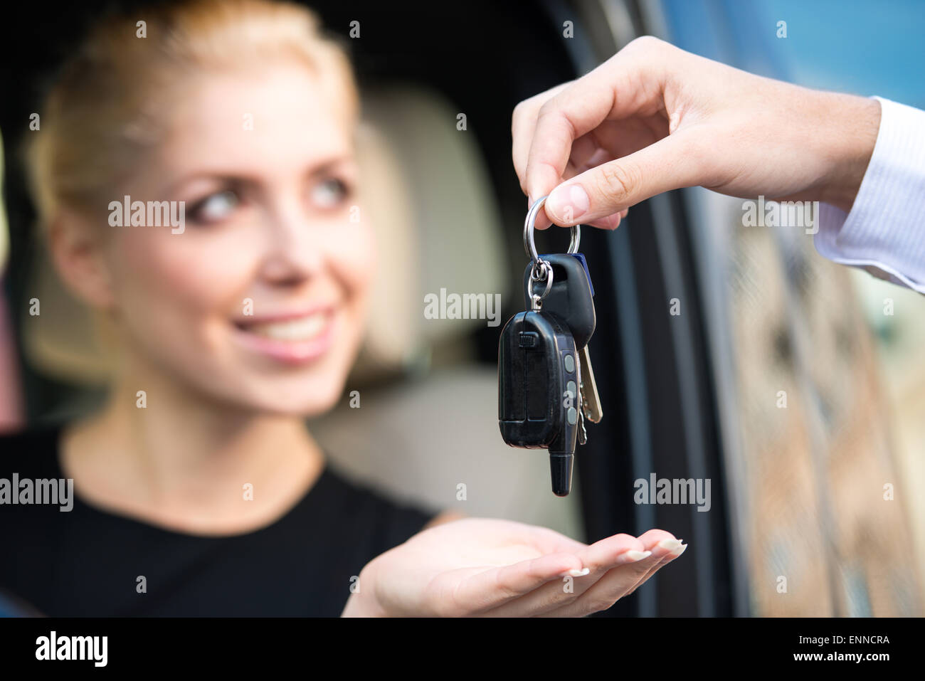 Woman and car keys hi-res stock photography and images - Alamy