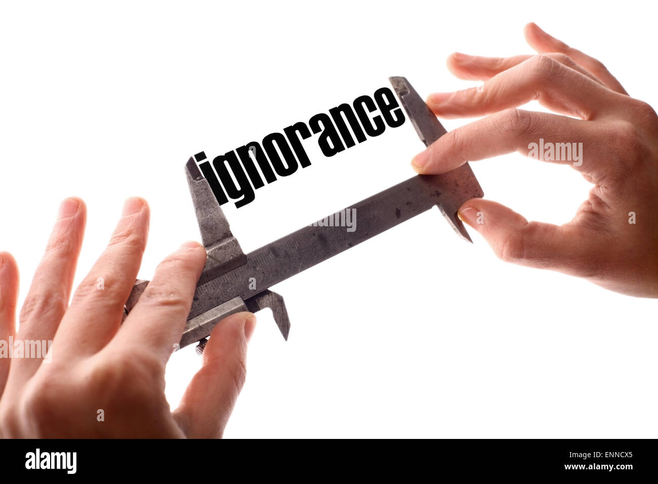 Color horizontal shot of two hands holding a caliper and measuring the ...