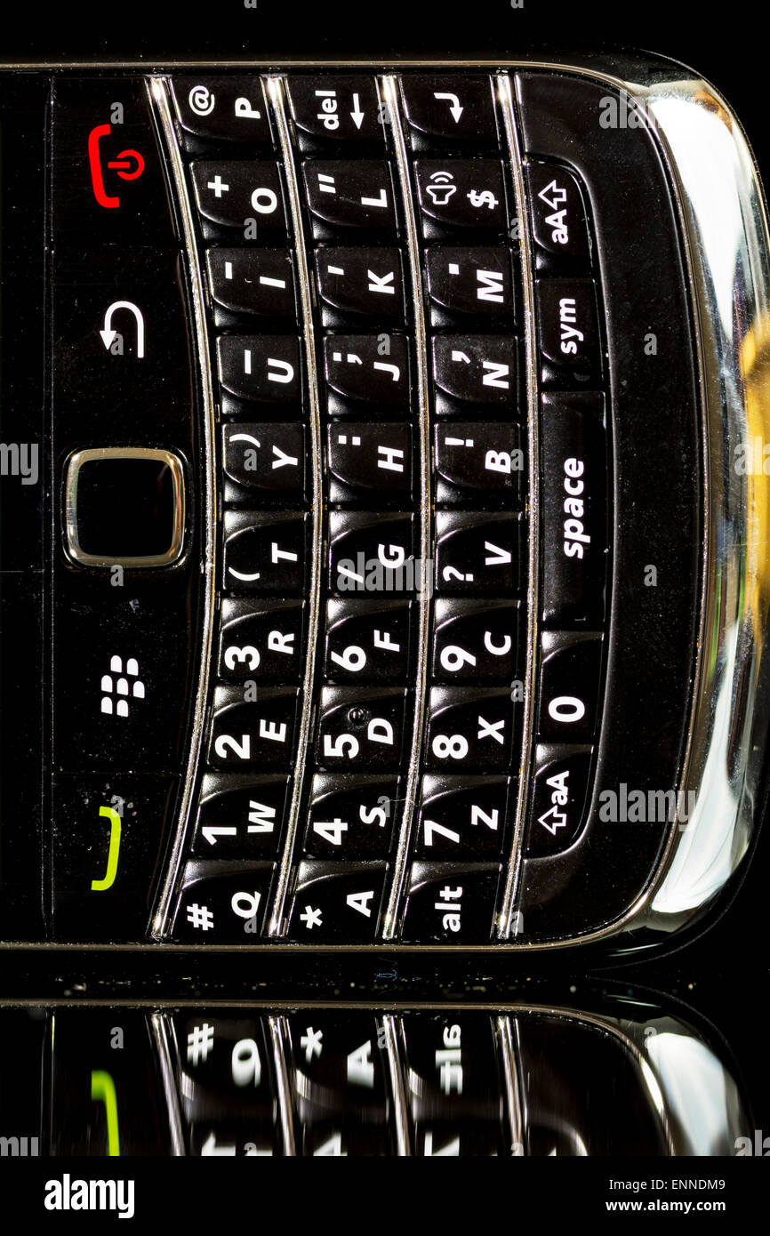 Mine keyboard on a small Cell Phone Stock Photo - Alamy