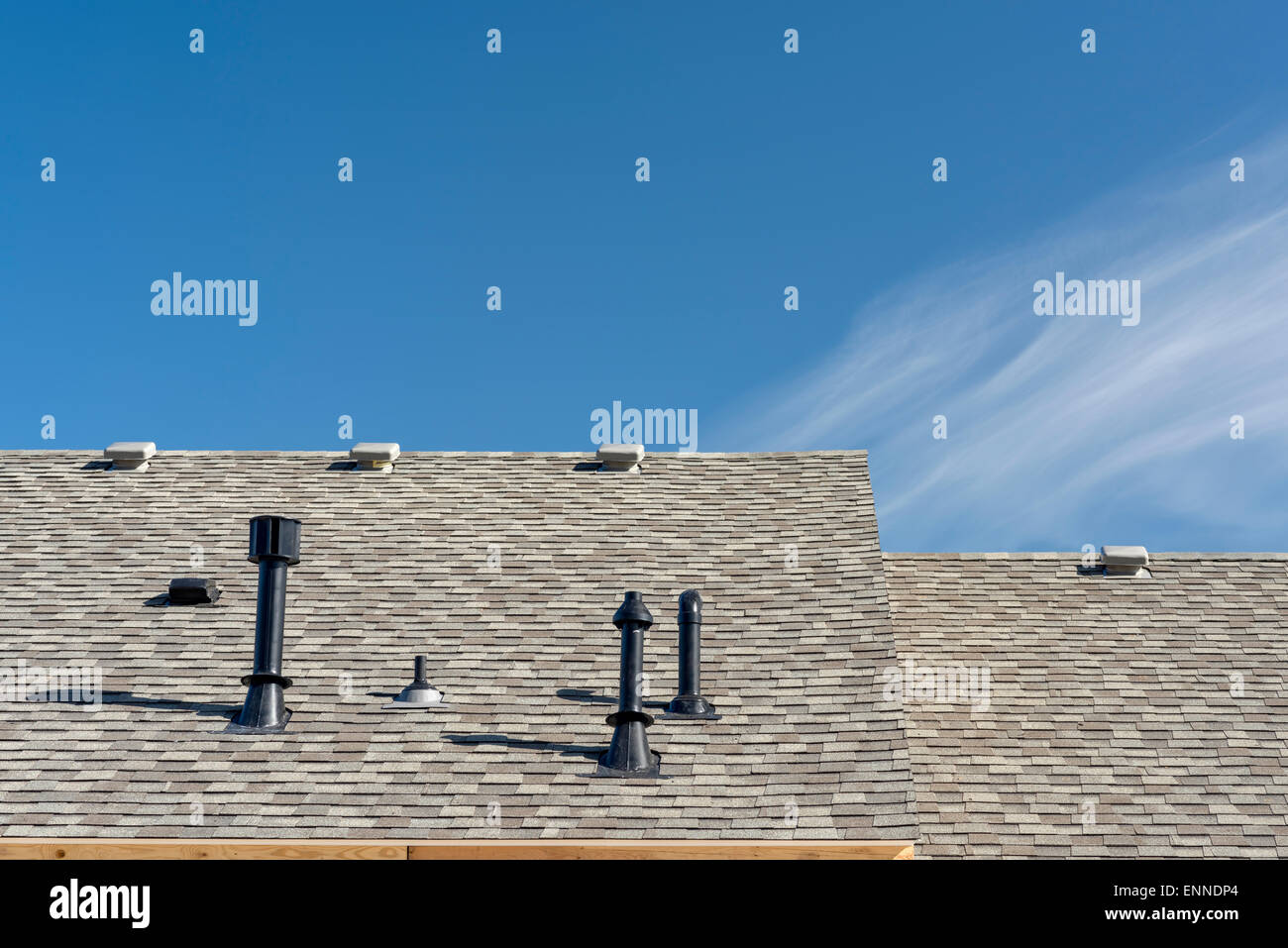 New home construction roof with utilities Stock Photo - Alamy