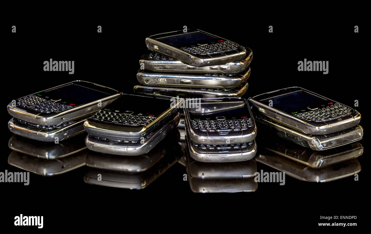 Stacks of smart phones on a table Stock Photo - Alamy