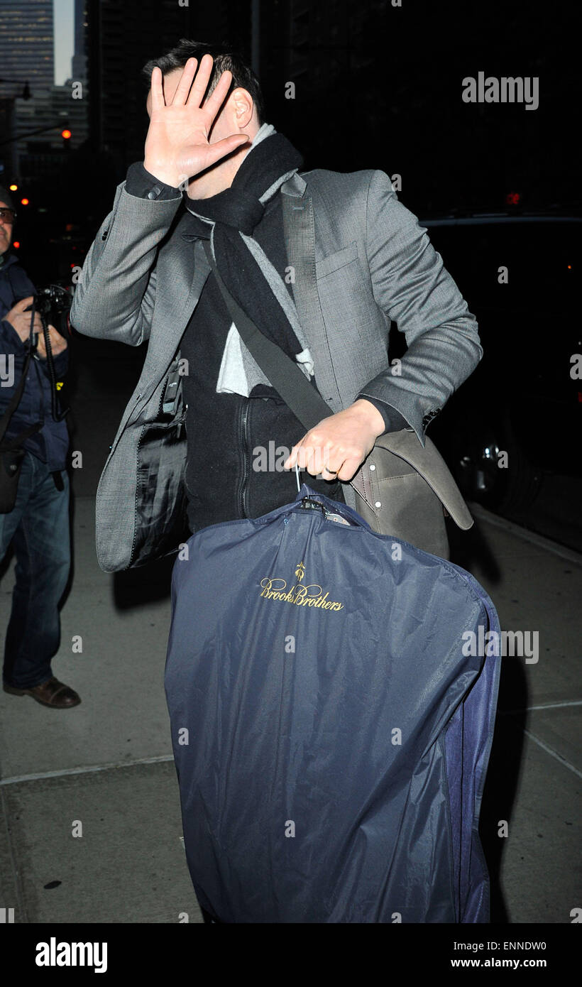 Keanu Reeves covers his face entering a hotel Featuring: Keanu Reeves ...