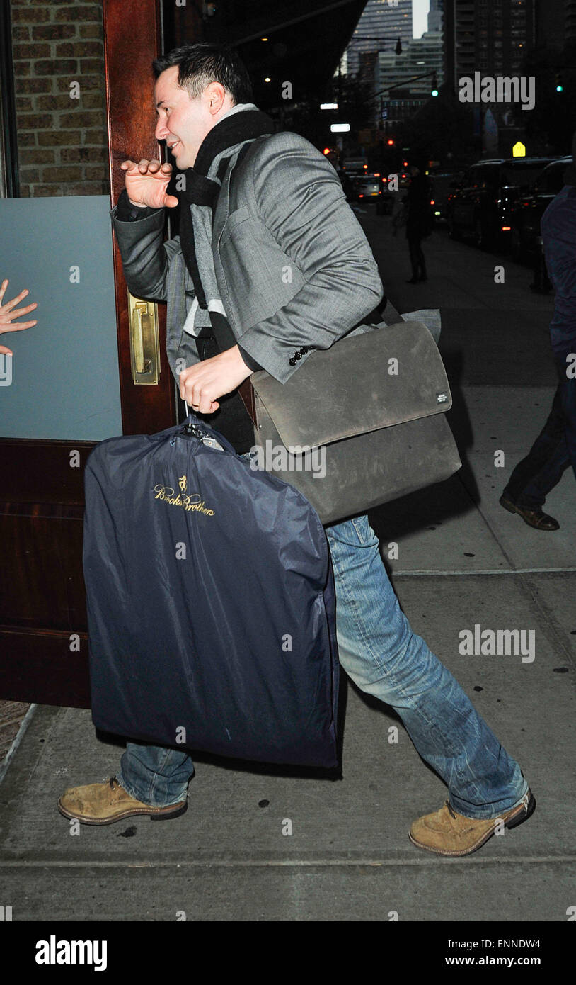 Keanu Reeves covers his face entering a hotel Featuring: Keanu Reeves ...
