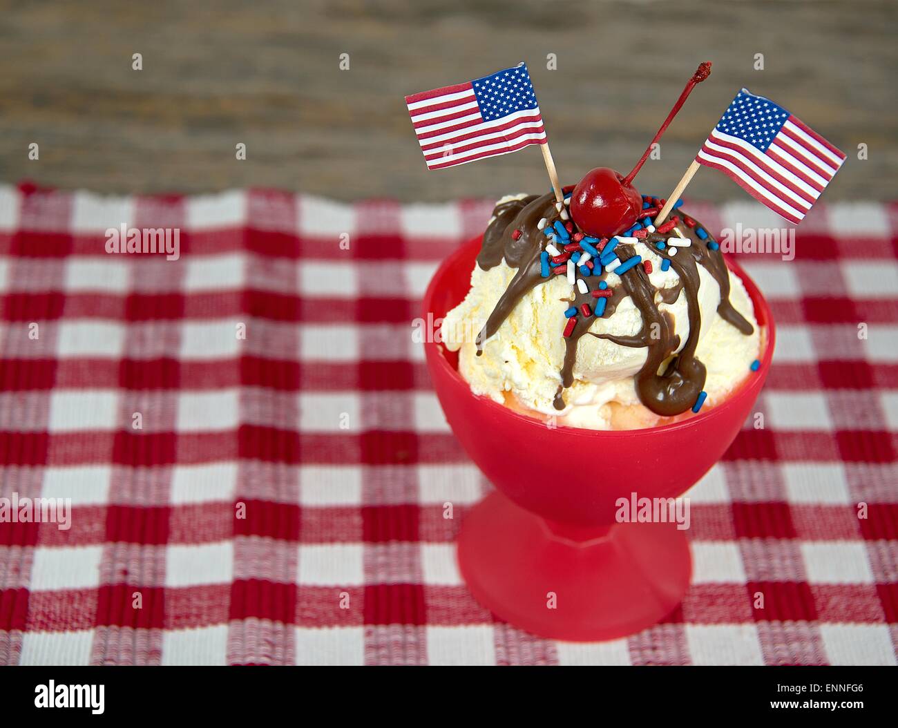 American flags on a chocolate sundae with red, white and blue sprinkles ...