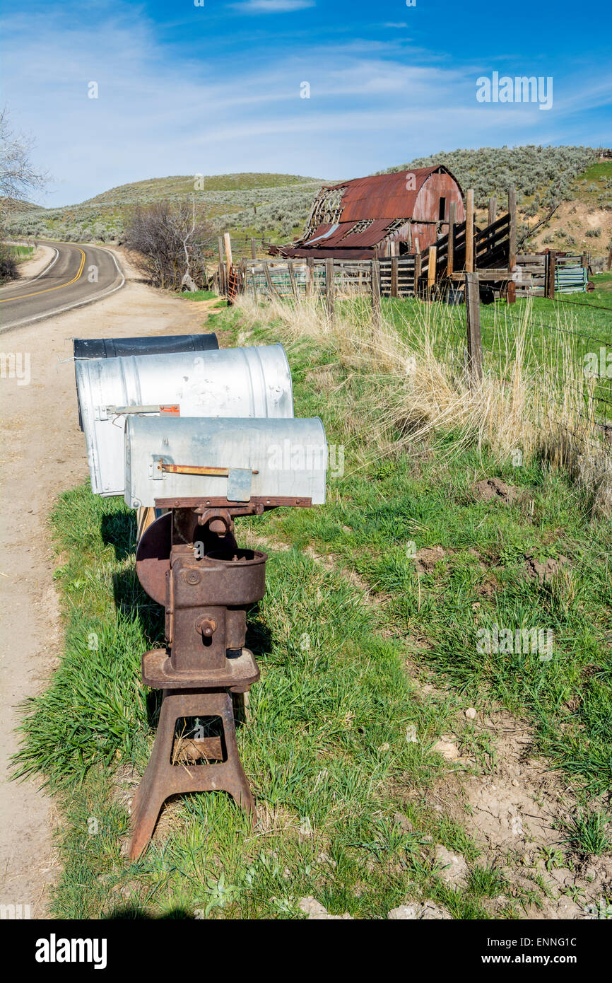 Rustic barn and mail boxes on road side Stock Photo - Alamy