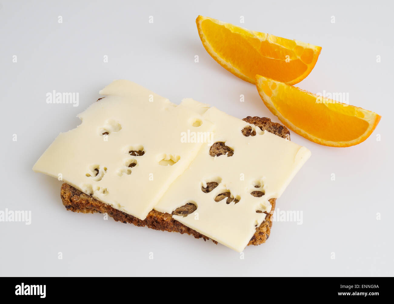 Crispy rye bread with cheese and orange Stock Photo - Alamy