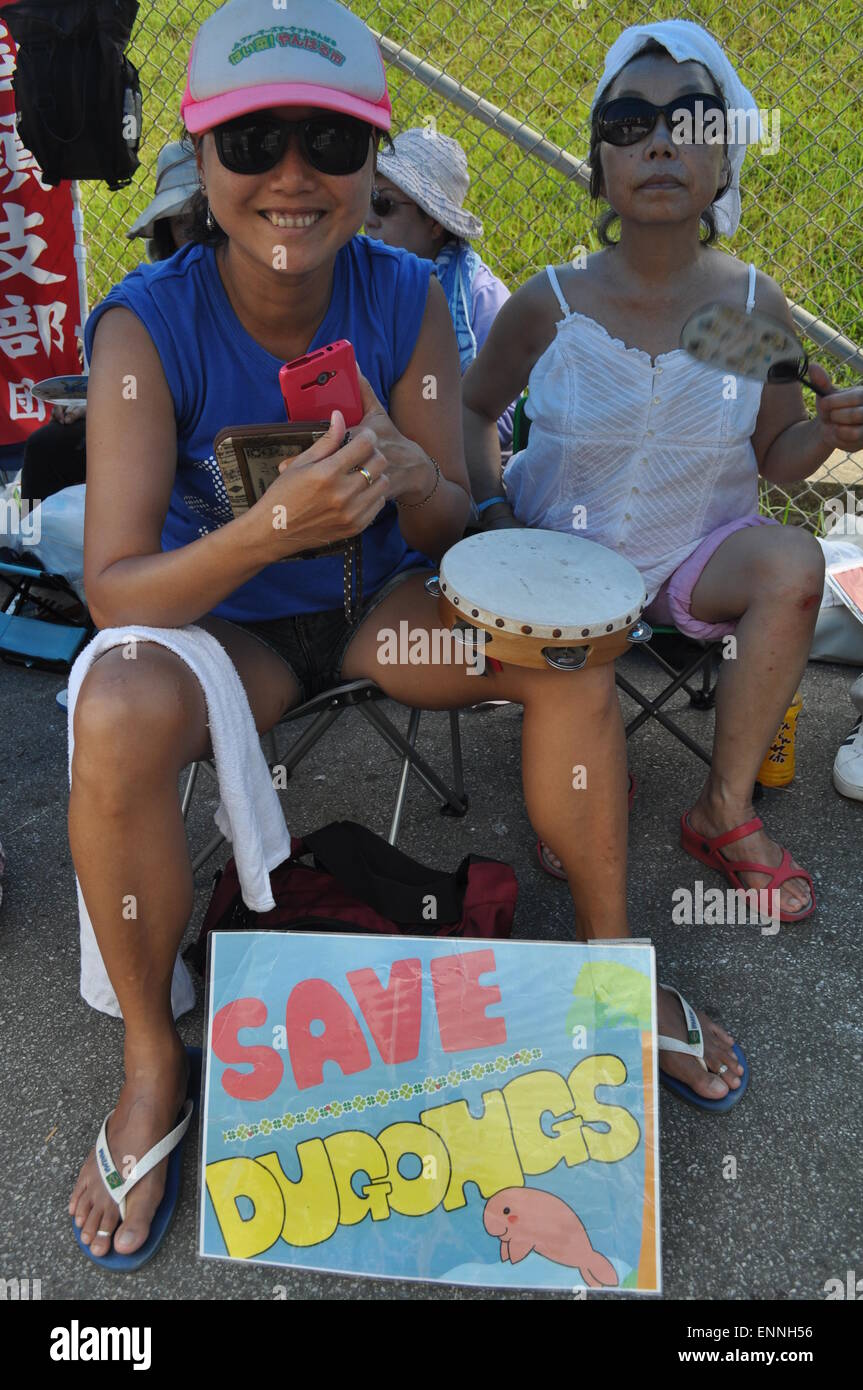 Okinawa, Japan: people protesting by Camp Schwab Marines base against ...